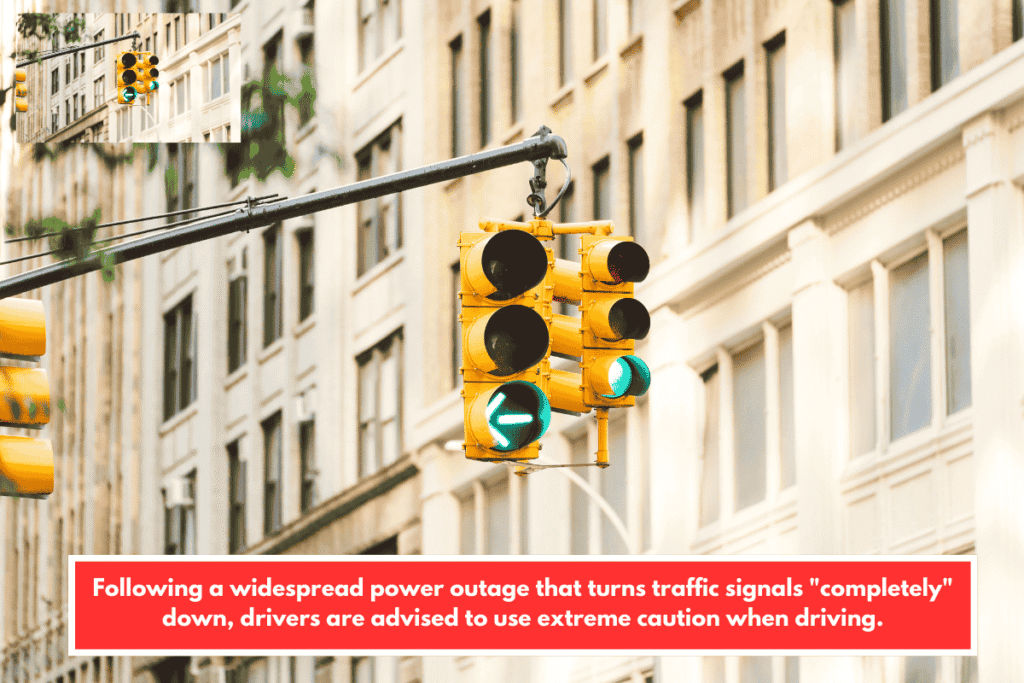 Following a widespread power outage that turns traffic signals ...